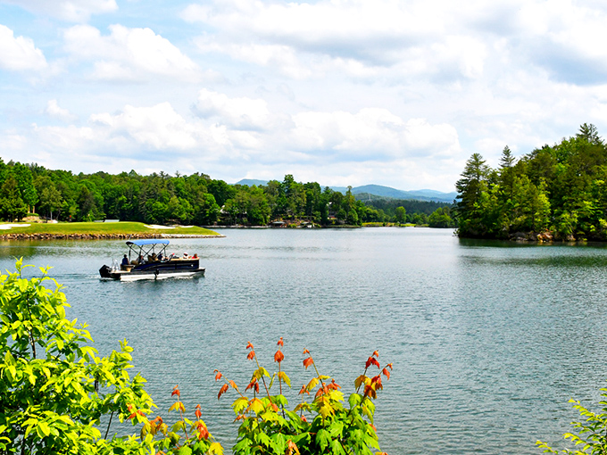 Lake Keowee's crystal waters invite pontoon adventures while mountains stand guard. Nature's perfect stage for memory-making.
