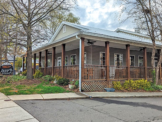 Mama Dip's welcomes you with its charming wooden porch &ndash; like stepping onto your favorite aunt's front steps before Sunday dinner.