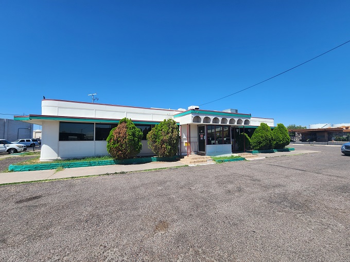 Classic Americana at its finest! Mel's white building with green trim promises the kind of breakfast that makes you want to linger over coffee.