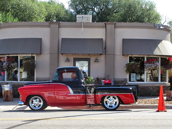 Mirror Lake Diner: That classic red and black pickup isn't just for show &ndash; it's setting the tone for the time-traveling breakfast experience waiting inside.