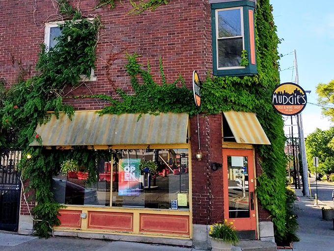Ivy-draped brick and yellow awnings &ndash; Mudgie's looks like the kind of place where sandwiches have their own fan club.