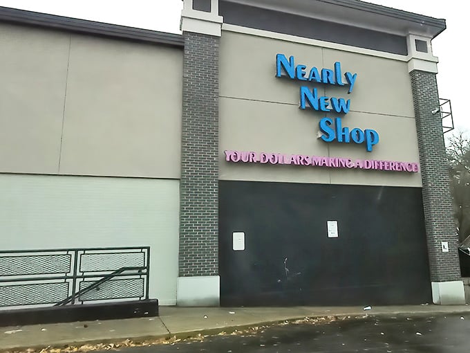 The bright blue "Nearly New Shop" sign promises treasure hunting adventures inside this Louisville bargain paradise.