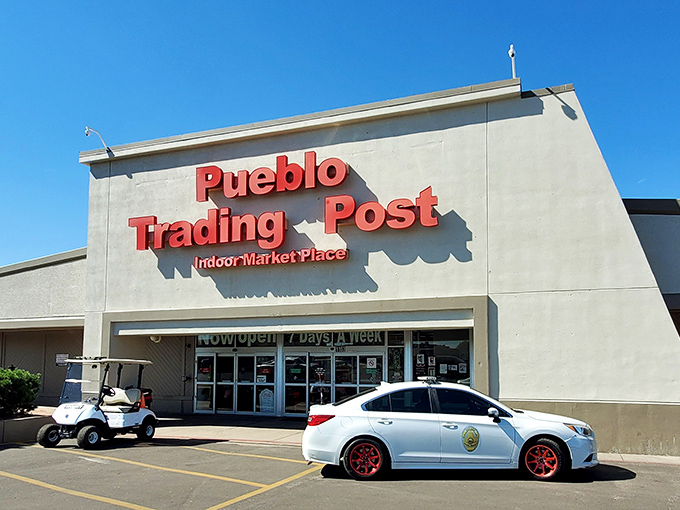 The Pueblo Trading Post welcomes bargain hunters with its bright red sign&mdash;like a beacon for treasure seekers everywhere!
