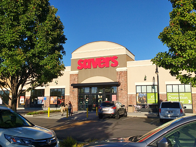 The bright red Savers sign beckons like a lighthouse for bargain hunters against Utah's clear blue sky.