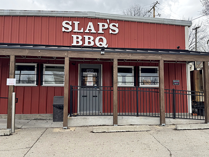 The humble red fa&ccedil;ade of Slap's BBQ &ndash; where BBQ greatness happens with zero architectural pretension.