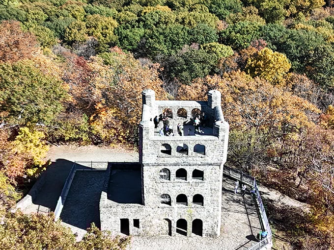 Sleeping Giant's castle-like stone tower stands proud against autumn foliage, like Connecticut's answer to Game of Thrones scenery.
