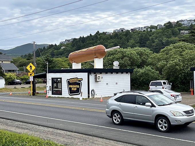 That giant hot dog on the roof isn't compensating for anything - Pronto Pup's corn dogs are genuinely that spectacular.