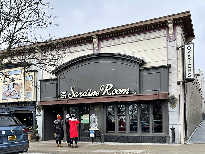 The Sardine Room's elegant storefront beckons like that friend who always knows where the good stuff is hiding.