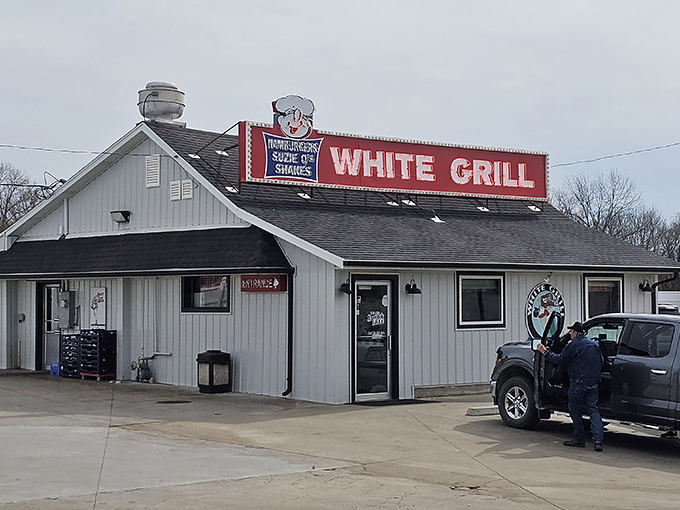 The White Grill's iconic sign promises burgers and shakes &ndash; a humble declaration that barely hints at the flavor paradise waiting inside.