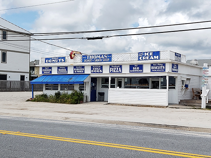 Thomas Donut's blue-trimmed beach shack hasn't changed in decades. Neither has the line of devoted fans every morning!