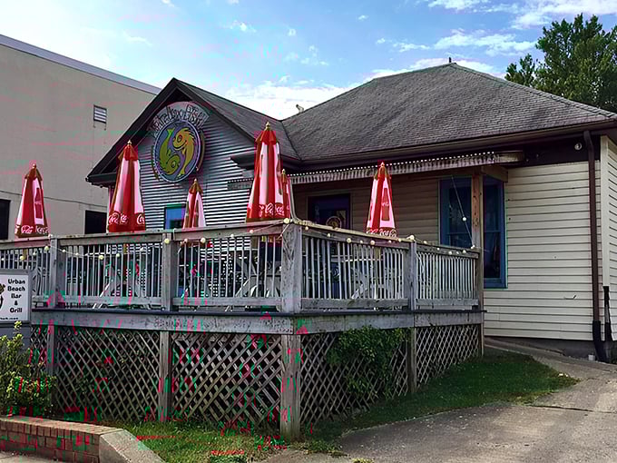 Tricky Fish exterior: "Beach vibes in the mountains! Tricky Fish's colorful deck promises seafood worth the sunburn you won't actually get."