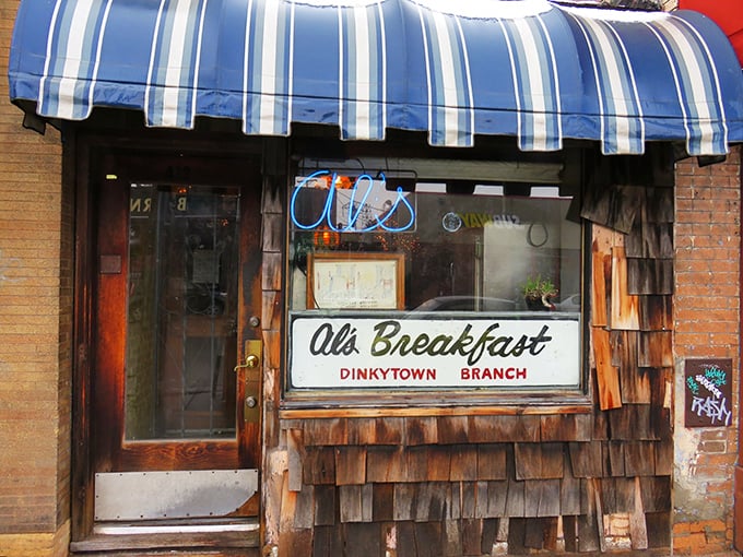 Al's may be narrower than some hallways, but those wooden shingles hide pancake magic that's wider than your smile.