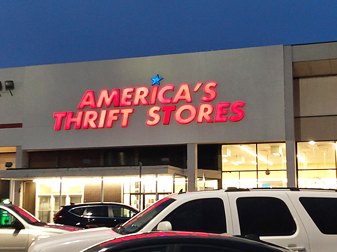 As day turns to night, America's Thrift Store glows with promise. Every aisle holds potential discoveries waiting to be claimed.