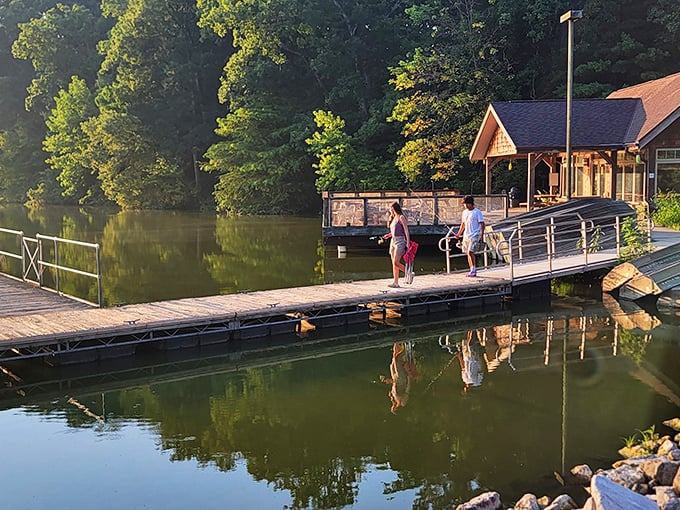 Wooden dock stretching into serene waters at sunset. Someone clearly designed this place for maximum "ahhhh" moments.