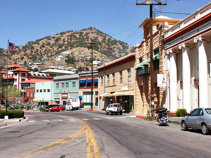 Main Street Bisbee, where mining history meets bohemian spirit under the watchful gaze of copper-tinted mountains.