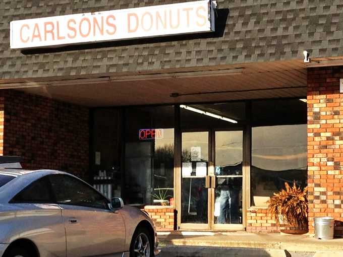 The sign says it all &ndash; Carlson's Donuts. No gimmicks, no hashtags, just decades of donut mastery awaiting inside those humble doors.
