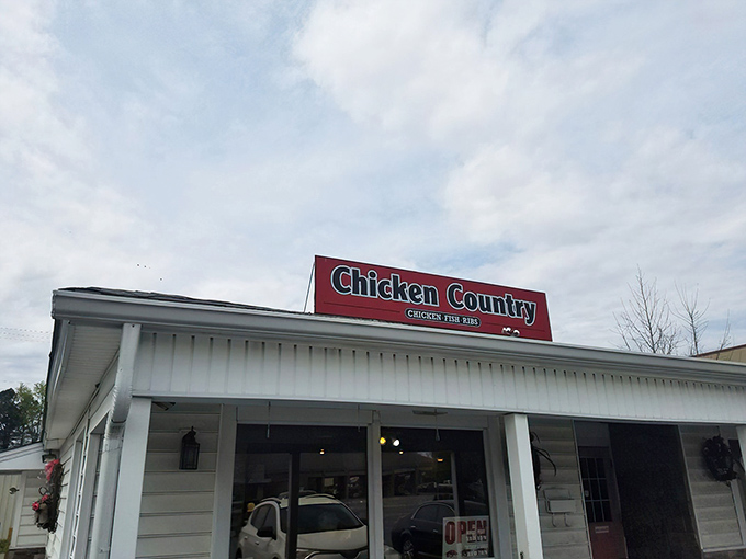 That Chicken Country sign promises more than just poultry&mdash;it's a beacon of hope for the hungry traveler.