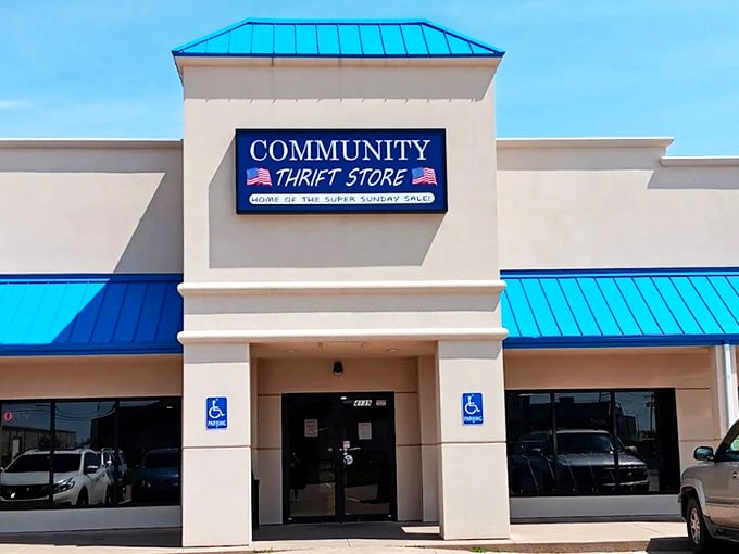 "Come in, the treasures are waiting!" This cheerful storefront promises the thrill of the hunt with its bold blue accents.