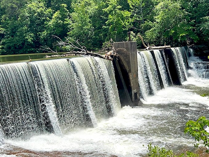 This cascading waterfall at DeSoto State Park performs its thunderous symphony daily, no tickets required.