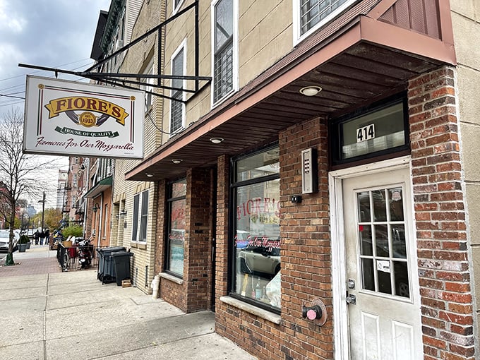 Fiore's legendary sign promises "house of quality" - and delivers with mozzarella so fresh it should have its own fan club.