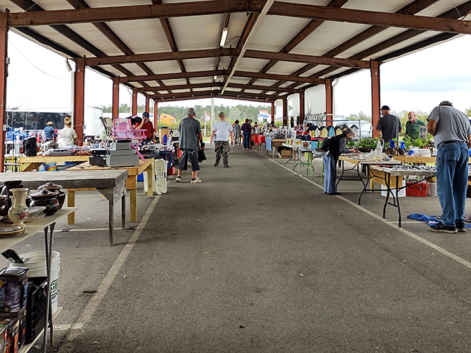 Long aisles of possibility! Every booth at Menge Flea Market holds someone's past treasure waiting to become your future conversation piece 