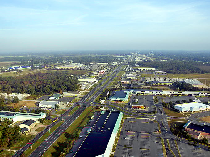 From this aerial view, Foley's sprawling layout reveals why your retirement dollars stretch further here than spandex after Thanksgiving dinner.