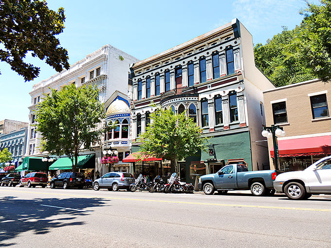 Colorful storefronts line Hot Springs' main drag, a living museum where retirement dollars stretch like taffy at a county fair.