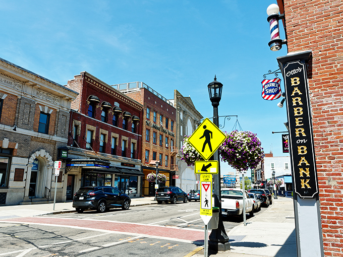 A classic New England barber shop sign hints at New London's old-school charm and reasonable prices. Haircuts and housing&mdash;both affordable here!