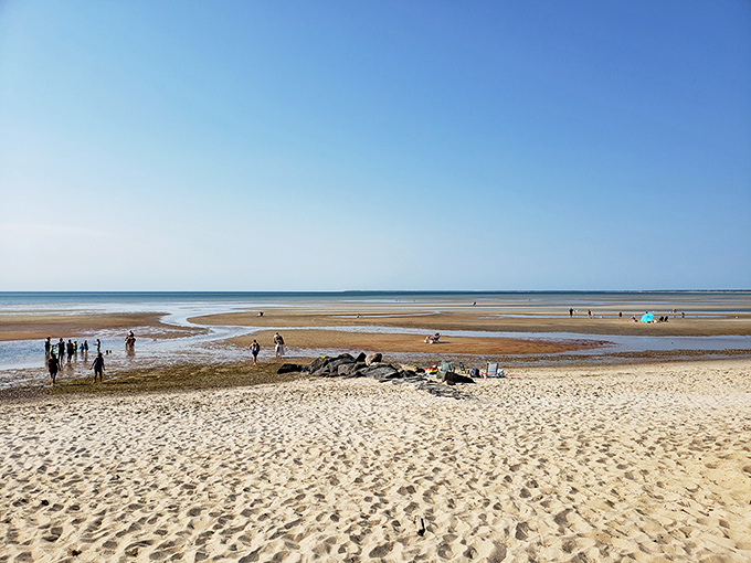 Low tide at Cape Cod reveals nature's playground&mdash;acres of rippled sand ready for exploration at this hidden beach gem.