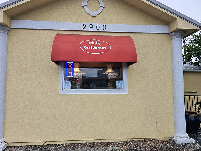 That iconic red awning isn't just decoration—it's a beacon calling hungry folks to breakfast paradise.