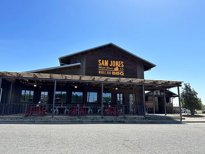 That wrap-around porch isn't just for show. It's where barbecue dreams come true while you wait for your whole hog fix.