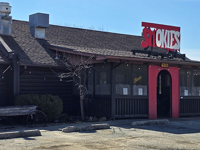 That weathered sign and rustic exterior? Classic BBQ joint semiotics for "prepare your taste buds for something legendary."
