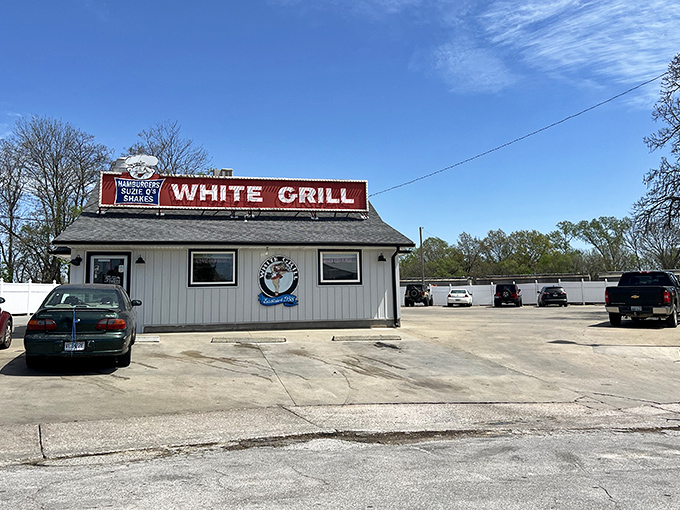 This unassuming white building houses burger magic that's been perfected over decades, proving great taste doesn't need fancy packaging.