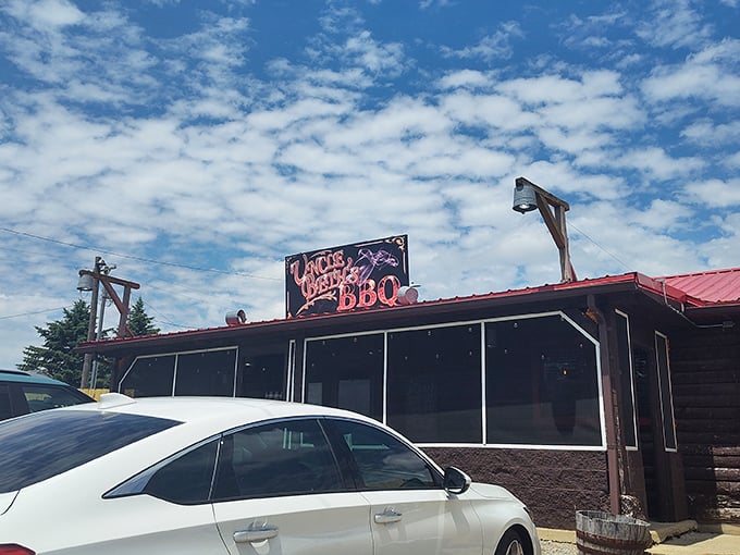 Simple building, extraordinary flavors. Uncle Beth's red-roofed BBQ haven proves the best smoke signals don't come from fancy establishments.
