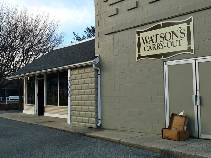 Watson's simple storefront is the culinary equivalent of Clark Kent's glasses – a humble disguise for superhero-level chicken.