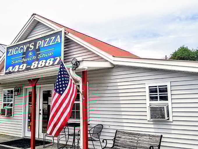 That American flag and cheerful yellow sign aren't just decoration &ndash; they're Ziggy's way of saying "welcome home" to pizza lovers.