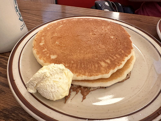 Golden-brown perfection awaits with these classic buttermilk pancakes, each one a fluffy canvas for butter and syrup masterpieces.