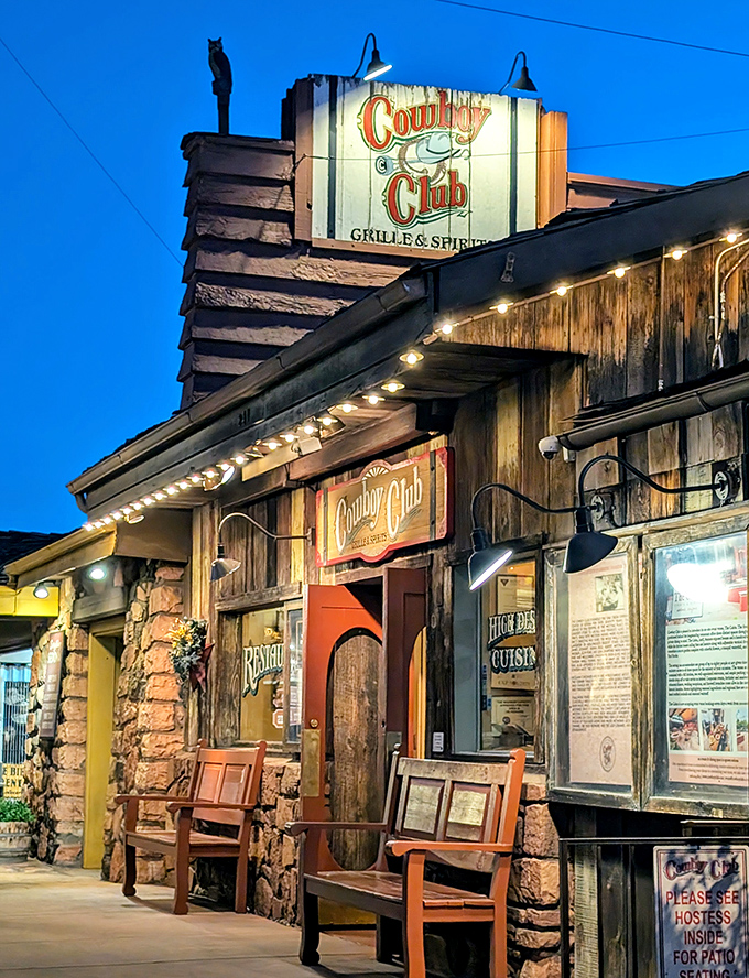 The Cowboy Club's rustic wooden exterior promises authentic Southwestern flavors with a side of Old West charm.