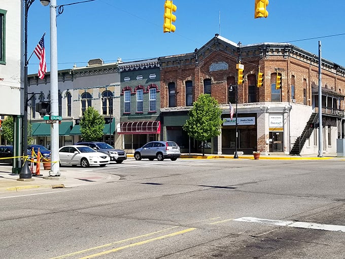 Historic brick buildings stand shoulder to shoulder like old friends, telling stories of generations who've walked these streets before you.