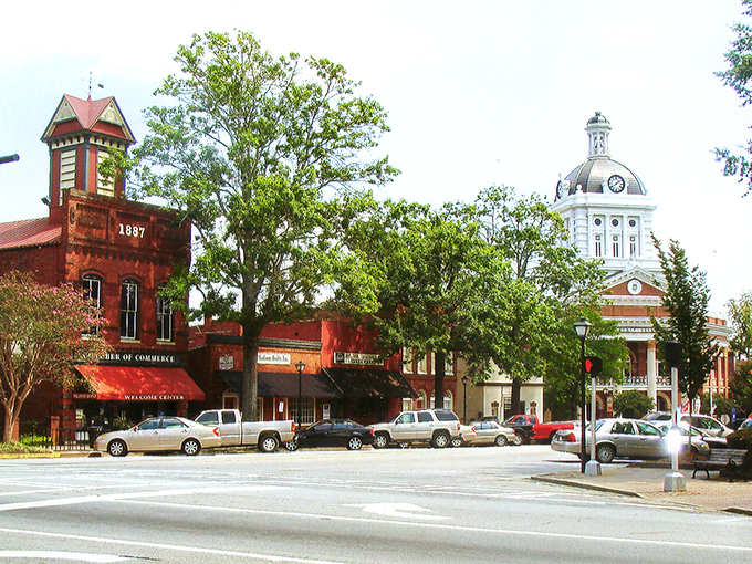The courthouse dome gleams in the Georgia sunshine, watching over Madison's downtown like a proud parent at a school recital.