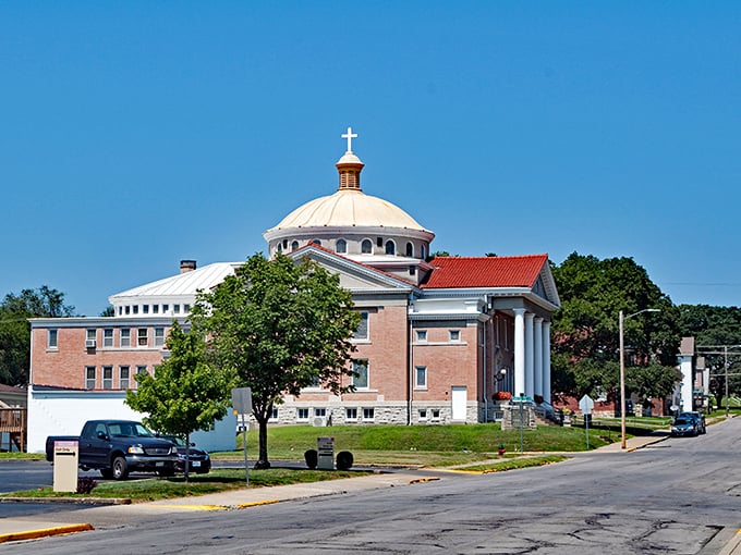 St. Benedict's Abbey stands as a testament to faith and architecture, its dome reaching skyward like retirement dreams finally within reach.
