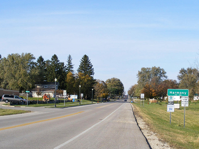 The road to Harmony promises adventure with every mile. That green highway sign might as well read "Welcome to Tranquility" for weary city souls.