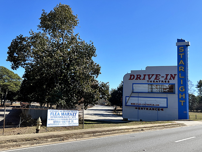 Where modern entertainment meets vintage charm. This blue and white entrance has welcomed movie lovers for generations.