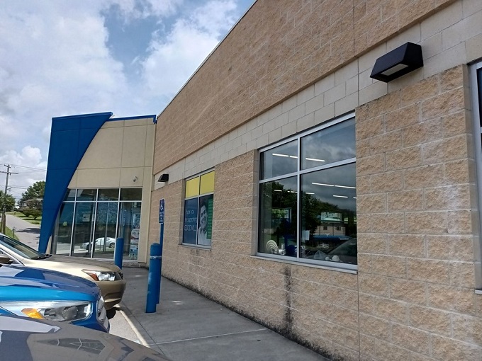 The modern exterior of Goodwill's Morgantown location features distinctive blue architectural accents, welcoming treasure hunters with the promise of unexpected finds inside.