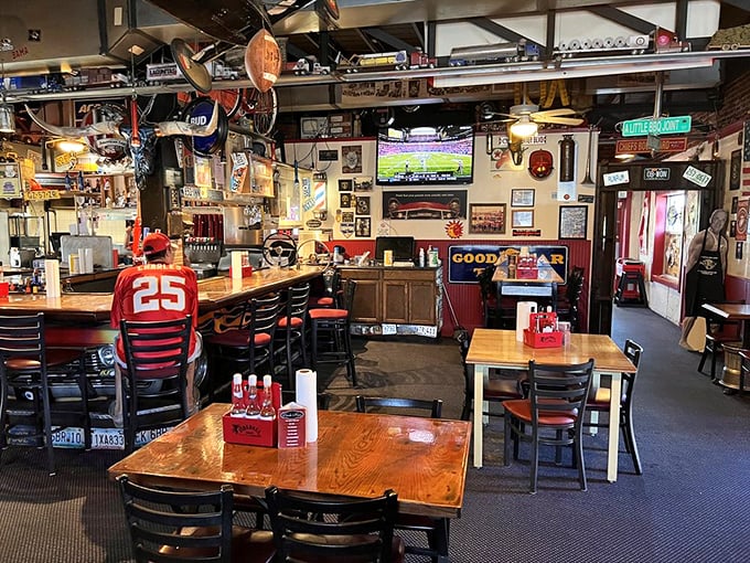 Step inside and you're greeted by a treasure trove of memorabilia, wooden tables, and that unmistakable aroma of slow-smoked perfection.