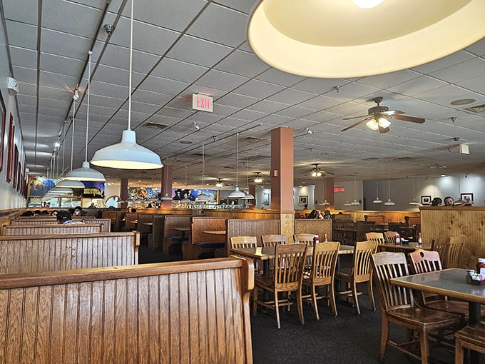 Wooden booths and practical lighting create the perfect backdrop for serious eating. No Edison bulbs or reclaimed wood here&mdash;just honest comfort and room for seconds.
