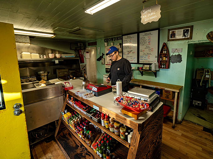Where culinary magic happens in humble surroundings. The mint-green walls and handwritten menu board tell you this place prioritizes flavor over frills.