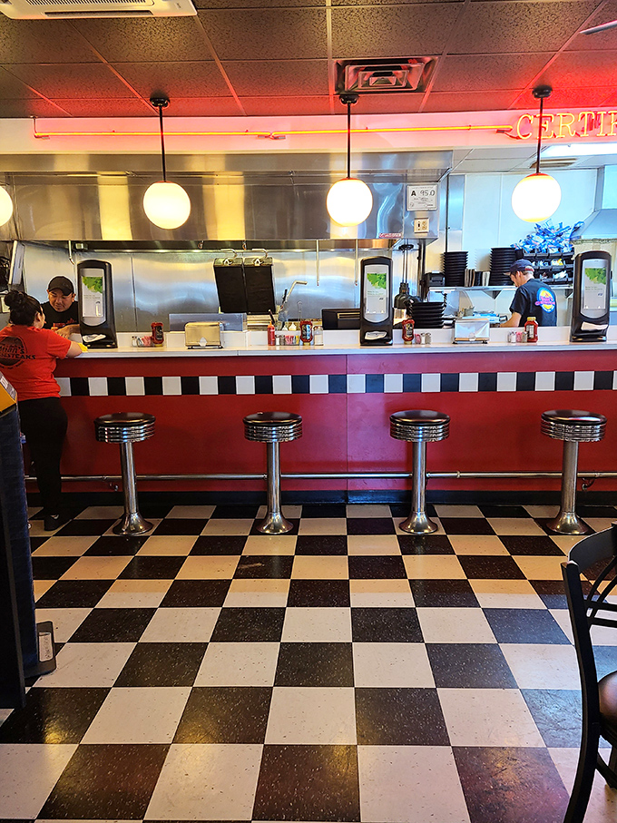 Classic diner aesthetics with a retro soul&mdash;those chrome bar stools invite you to grab a front-row seat to the cheesesteak symphony.