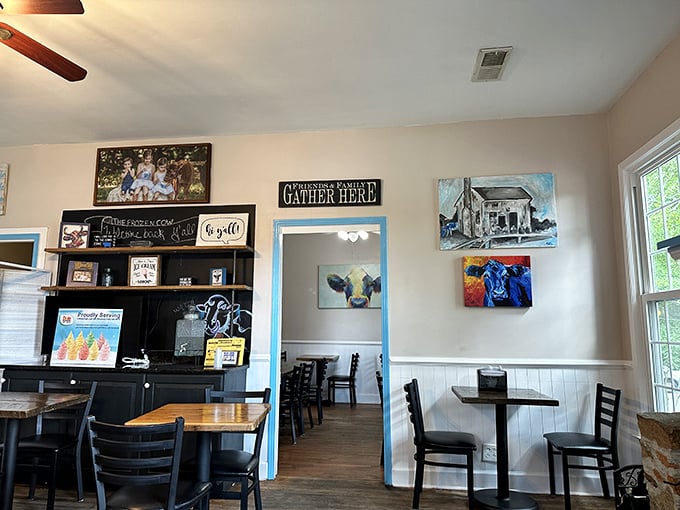 Cow art that's actually tasteful! The interior balances rustic charm with that "gather here" hospitality that makes you want to linger long after your cone is gone.