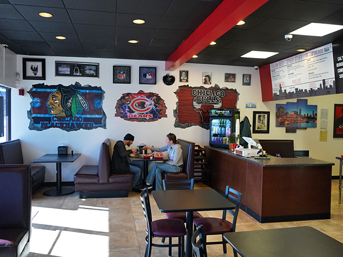 Chicago sports memorabilia transforms this simple dining space into a Windy City embassy where Cubs fans can feel right at home.